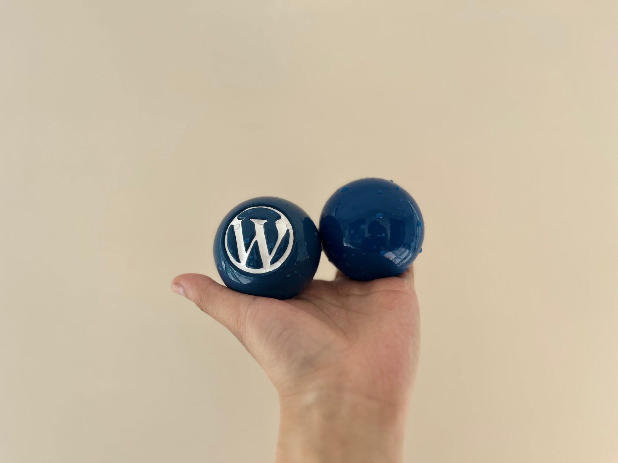 WordPress Blue Ball Wallpaper Collection: Two balls in palm | WP Wallpaper